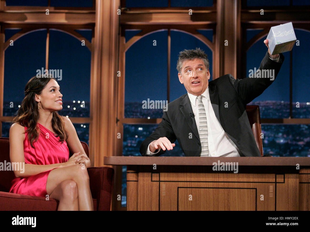 Actress Rosario Dawson, left, listens to host Craig Ferguson explain ...