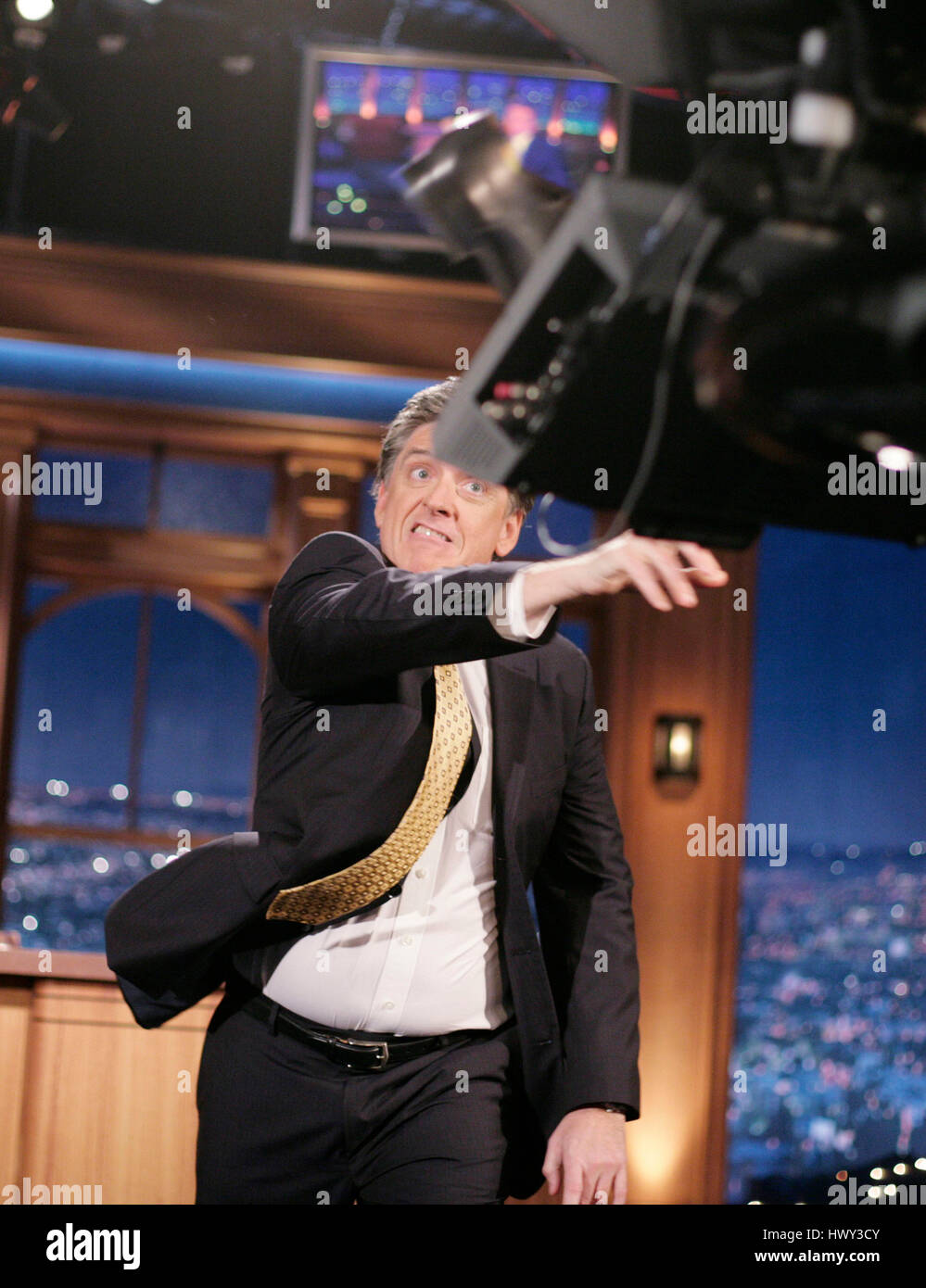 Host Craig Ferguson throws his shoe at the camera during a segment of ...