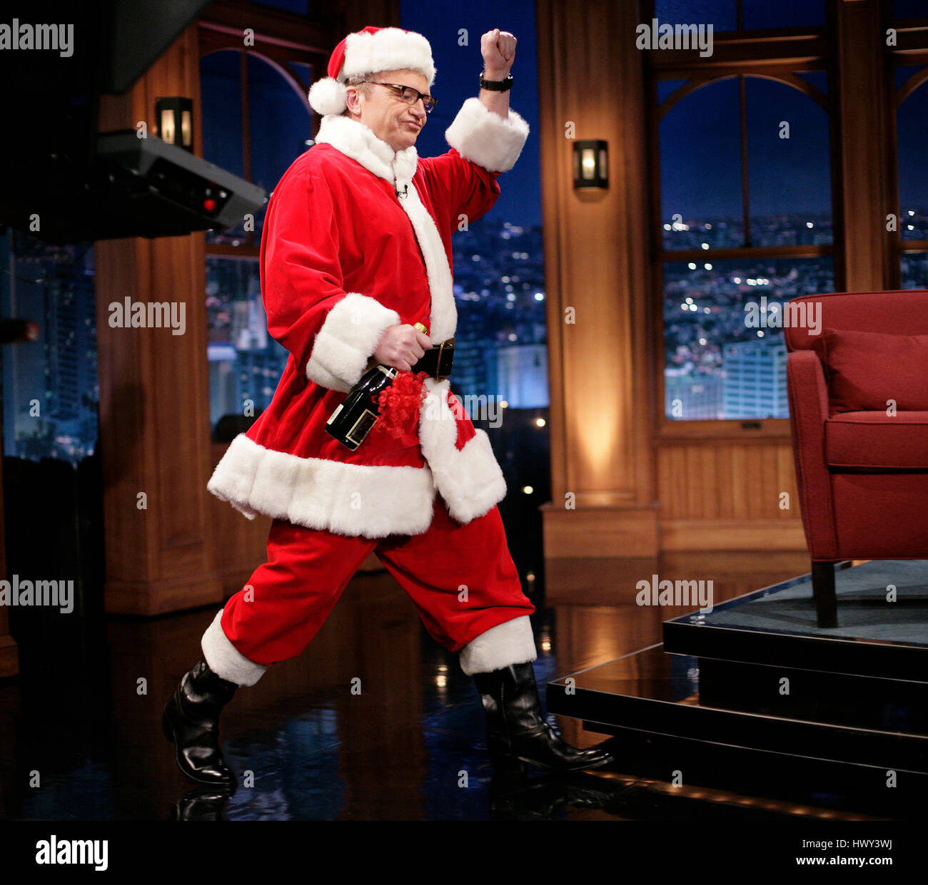 Actor Tom Arnold in a Santa Claus suit during a taping of a holiday ...