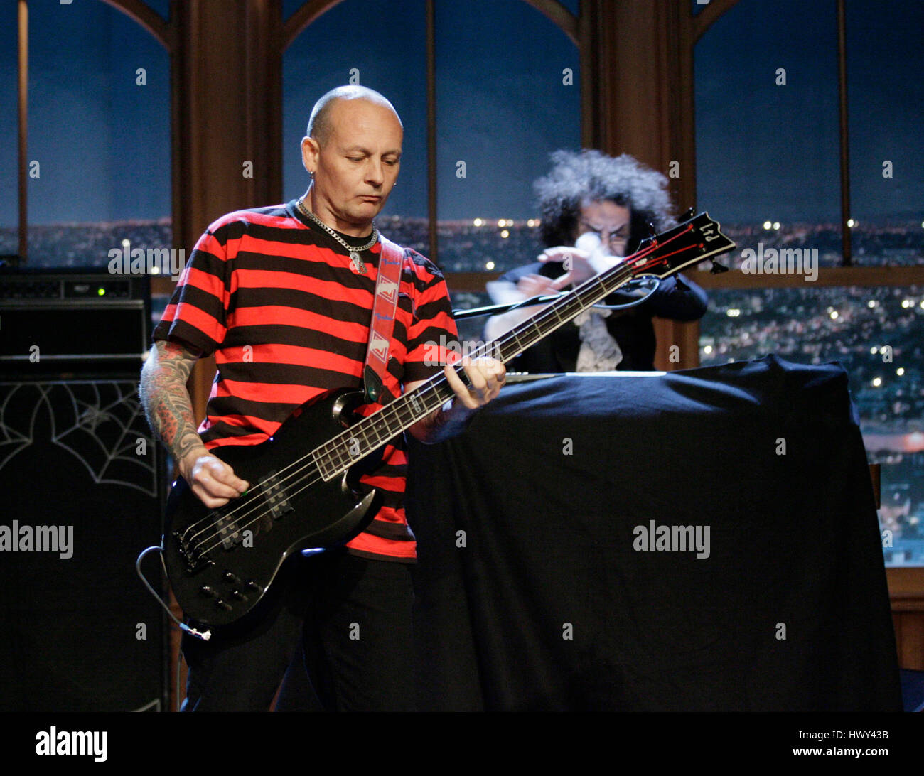 The punk band, 'The Damned" with Stuart West on bass guitar perform ...