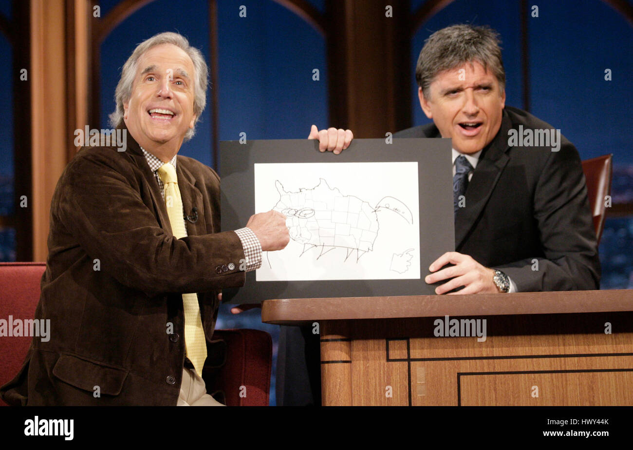 Actor Henry Winkler, left, shows host Craig Ferguson a drawing during a ...