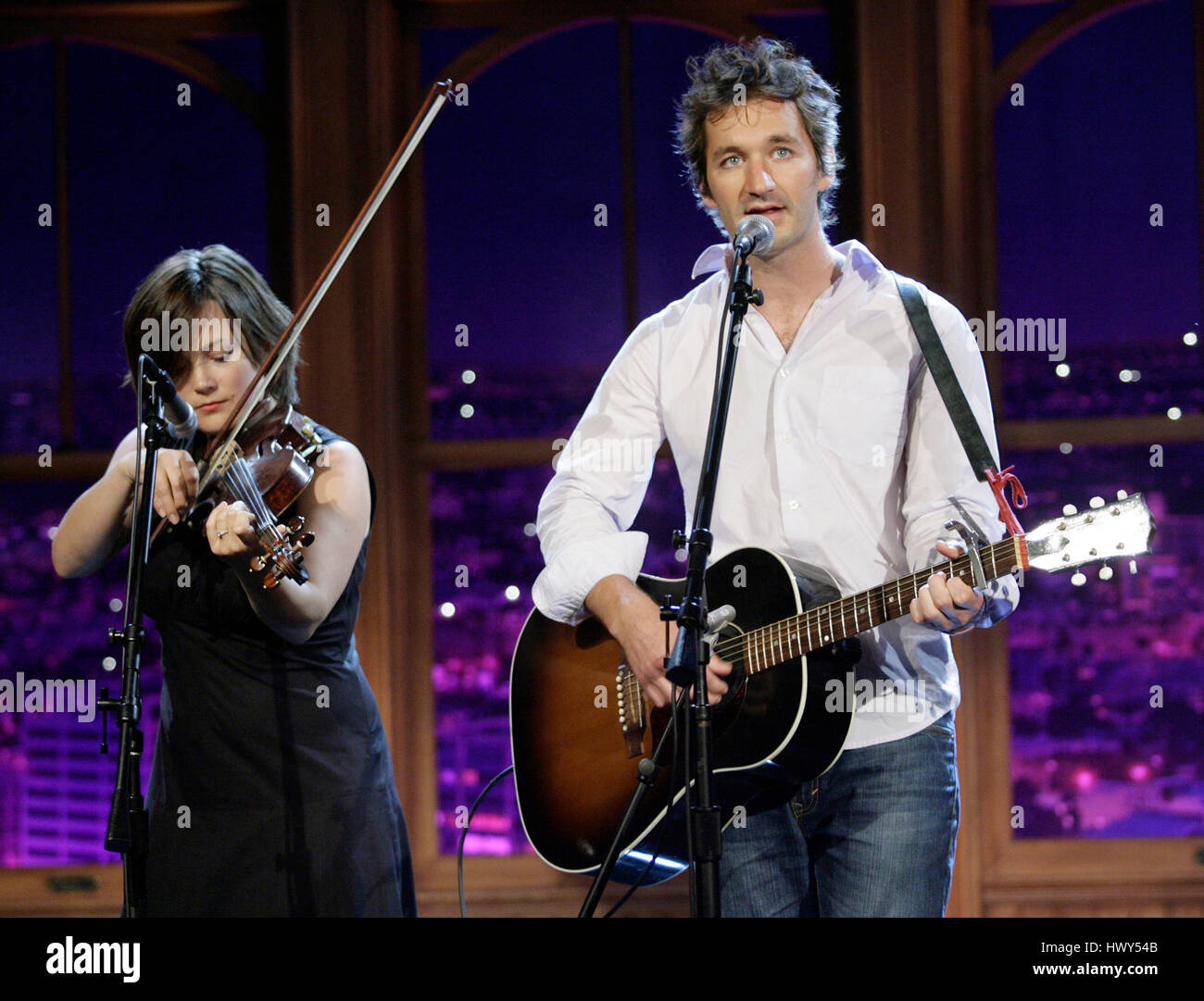 Musician Griffin House, right, and his band performs during a segment ...