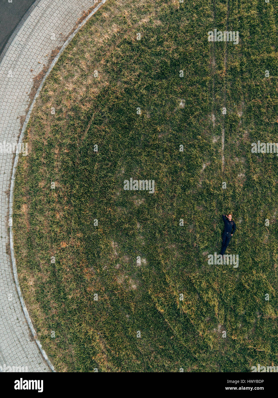 Man alone on roundabout hi-res stock photography and images - Alamy