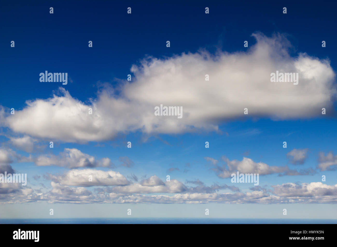 Perfect clouds on a blue sky in a daytime Stock Photo - Alamy
