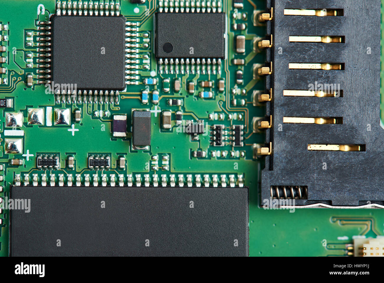 Closeup of electronic board circuit with digital components and chips ...