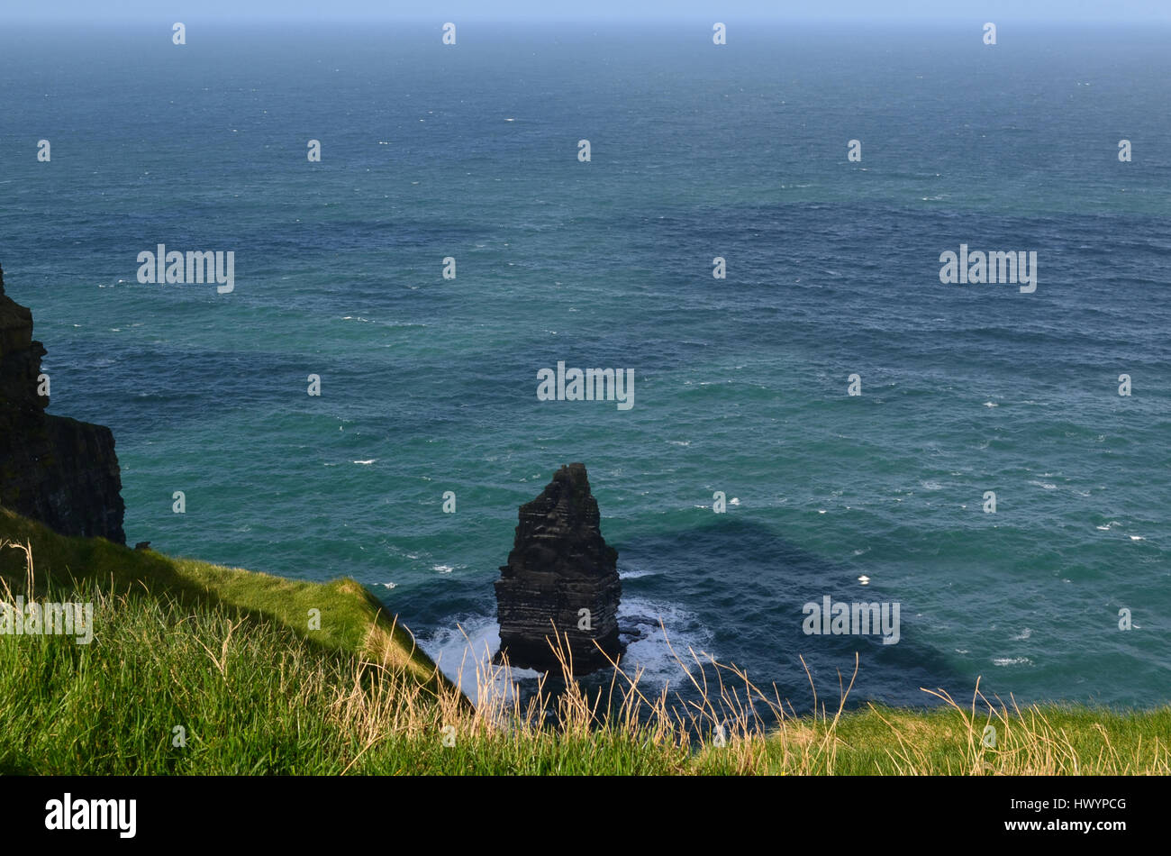 Large towering rock formation off the Cliffs of Moher in Ireland Stock ...