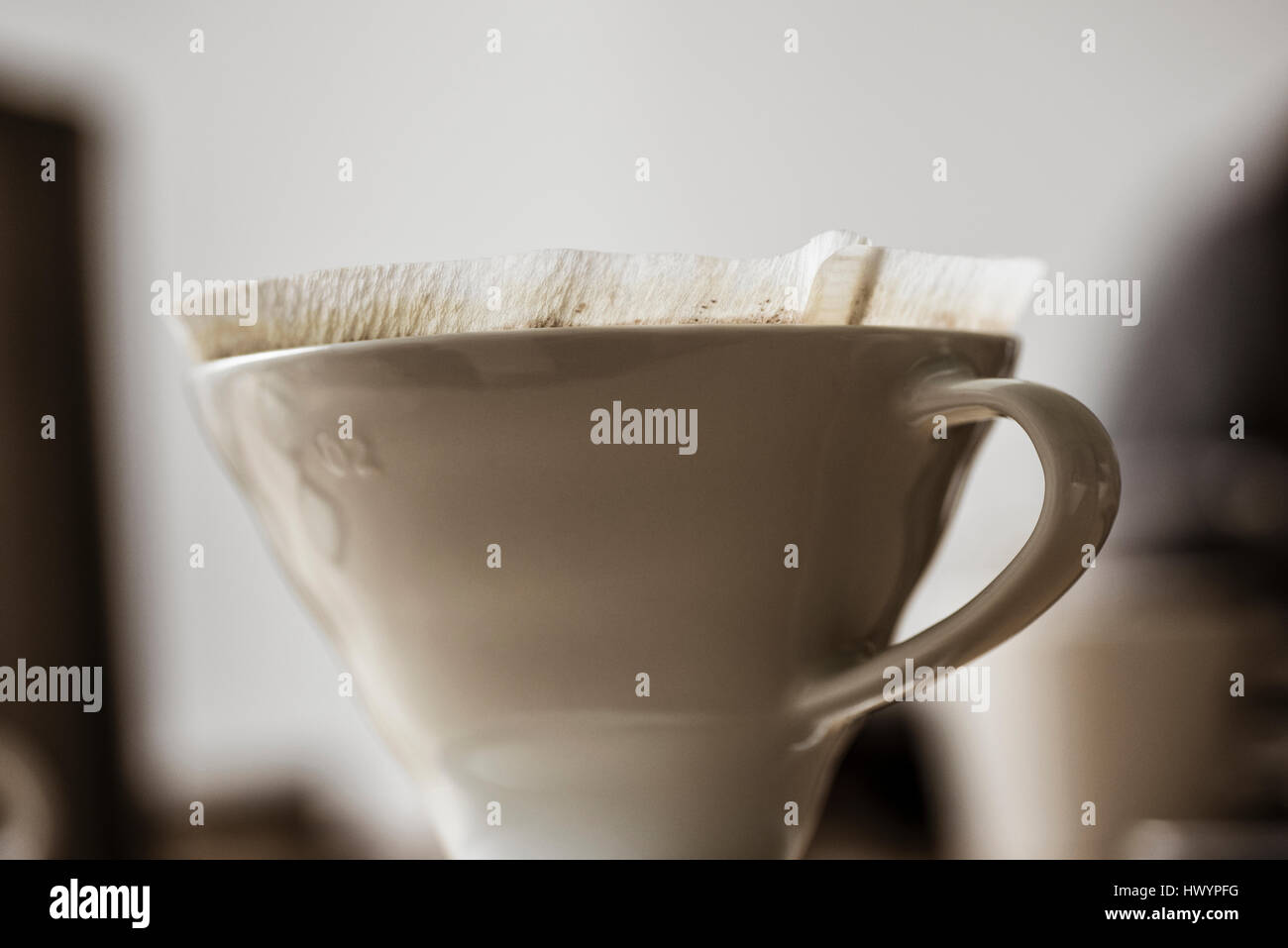 Used porcelain coffee filter Stock Photo - Alamy