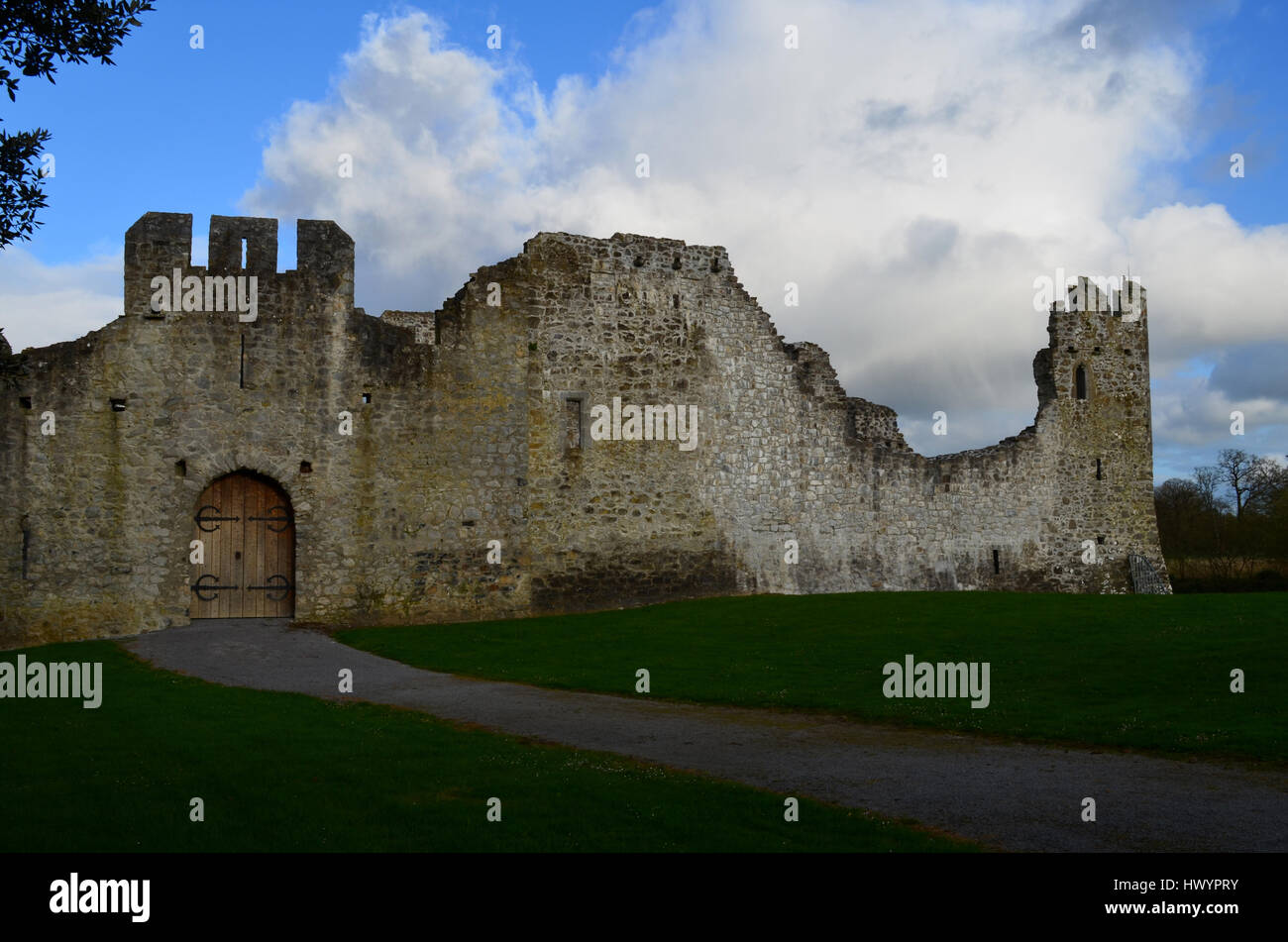 Desmond castle walls in Adare Ireland Stock Photo - Alamy