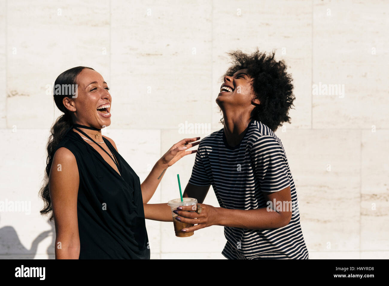 Two laughing friends Stock Photo - Alamy