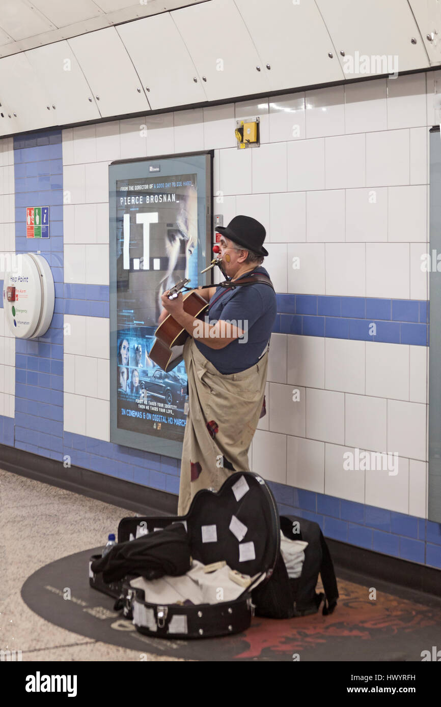 A busker in the London Underground Stock Photo - Alamy