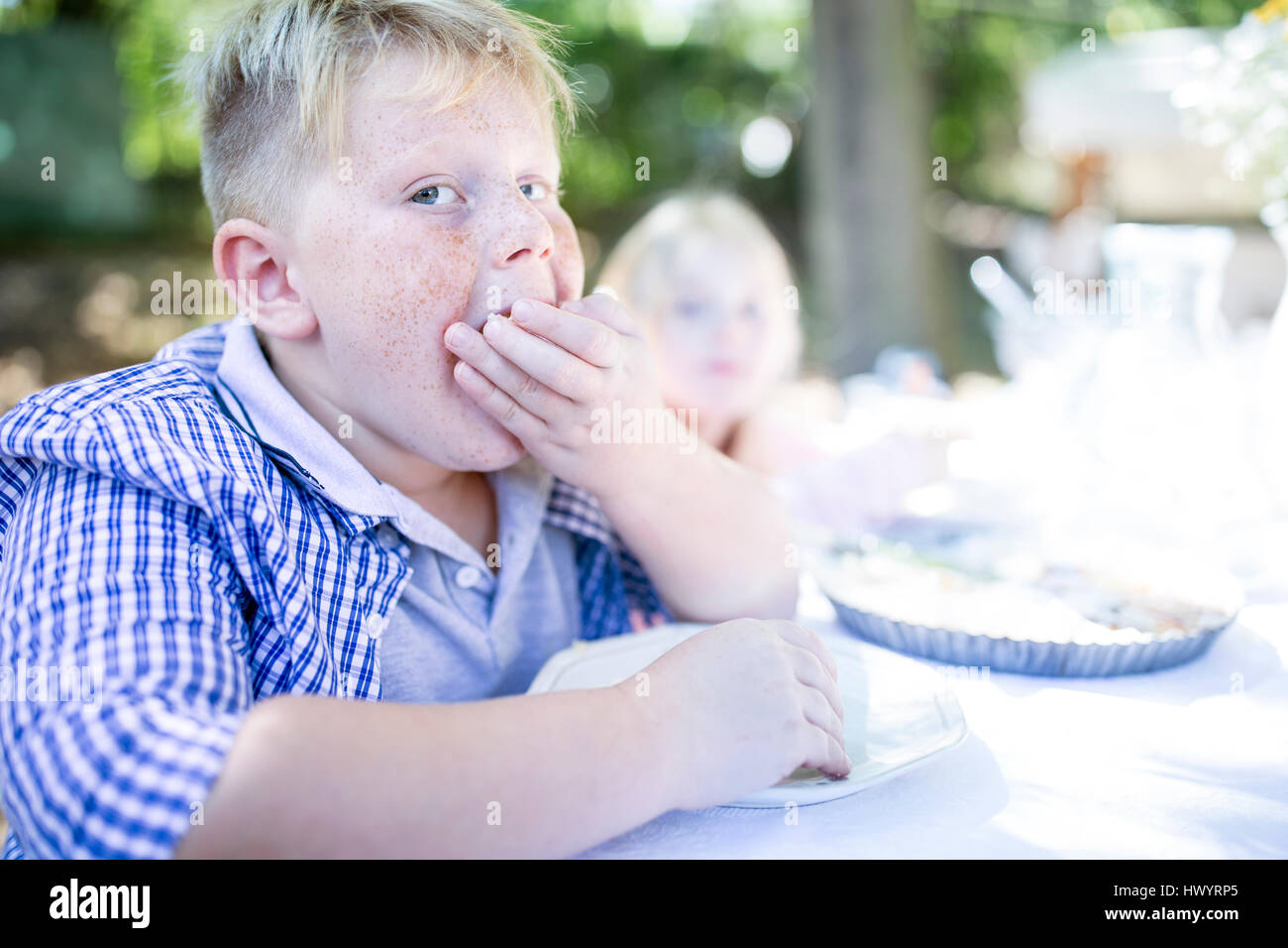 Fat boy eating hi-res stock photography and images - Alamy