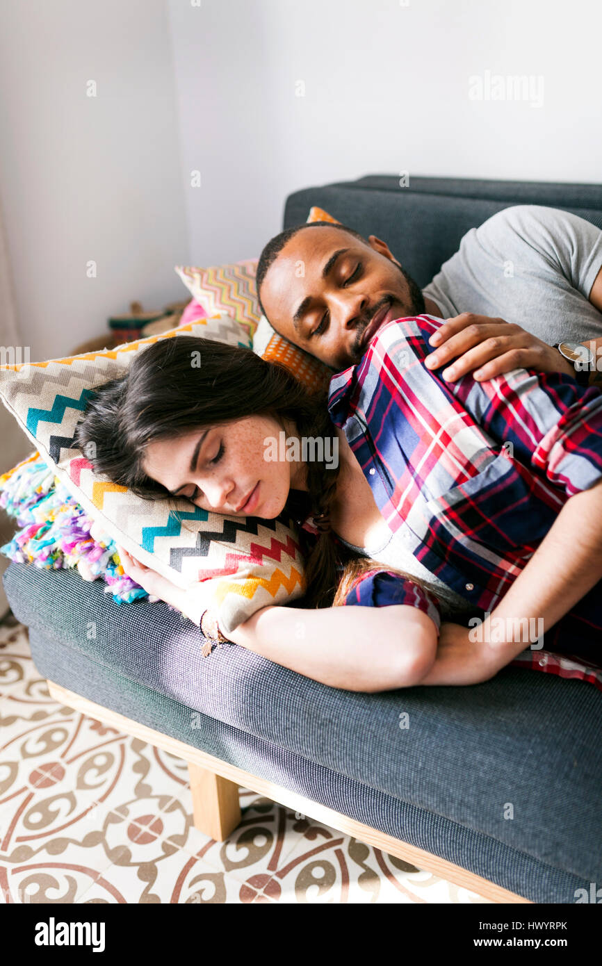 Man taking a nap sofa hi-res stock photography and images - Alamy