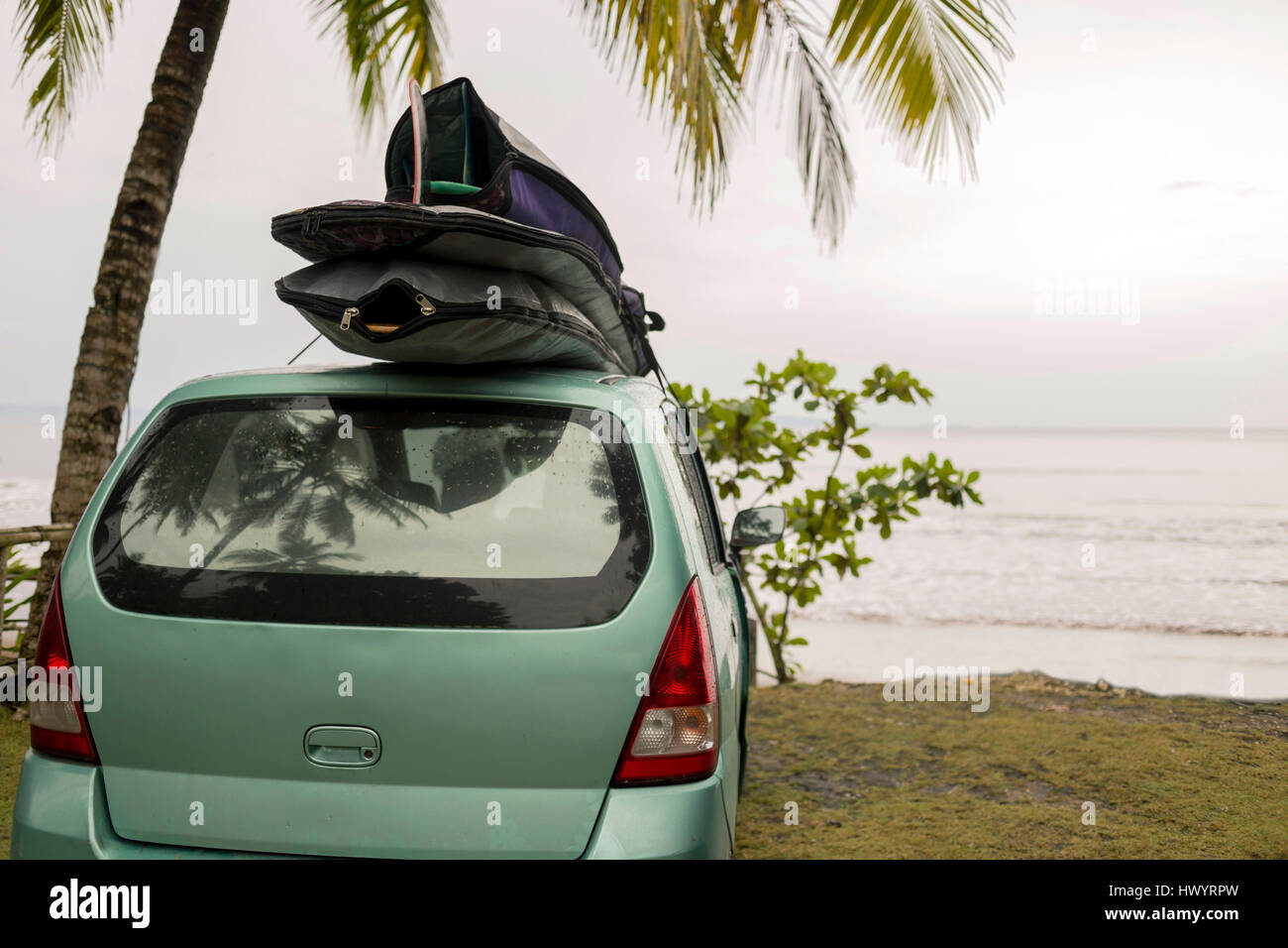 Indonesia, Java, car with surfboards on the roof at the coast Stock ...
