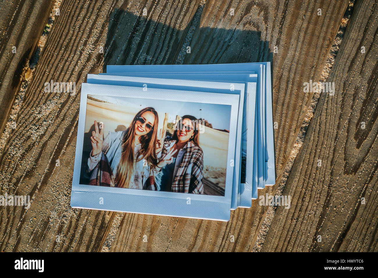 Stack of instant photos of young woman hi-res stock photography and ...