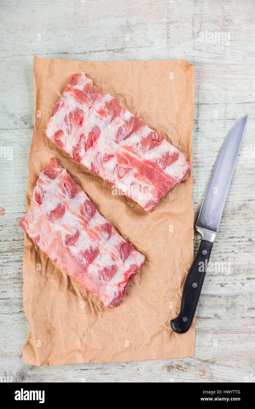 Raw spare ribs on brown paper brown paper hi-res stock photography and ...