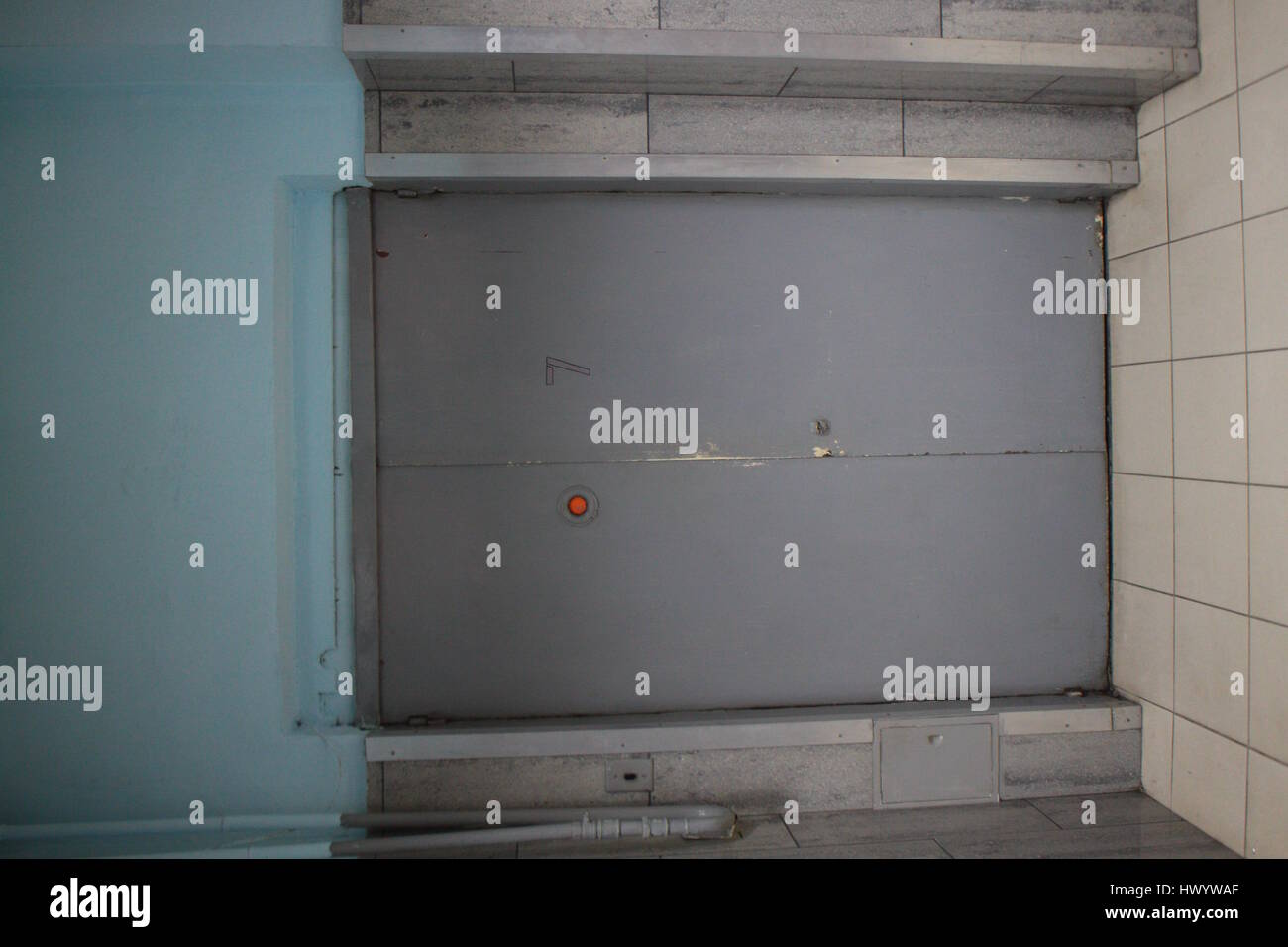 Door to the elevator in an abandoned building Old Soviet lift in the ...