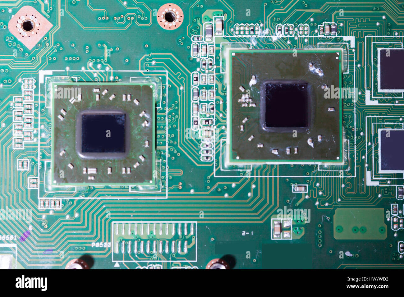 Close-up of electronic circuit board with chips and processors ...