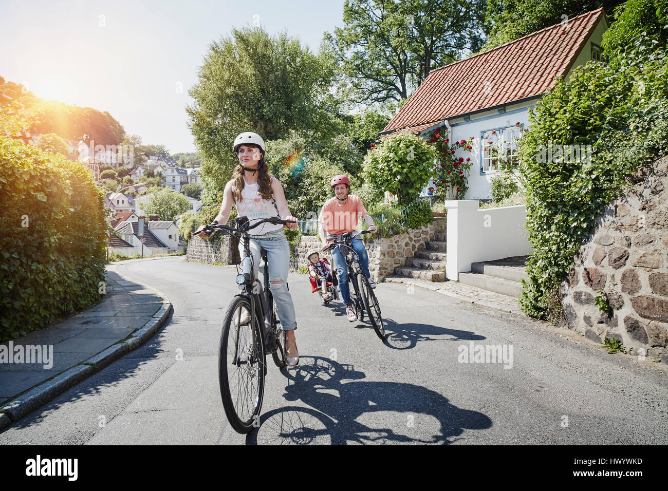 Family riding e bikes hi-res stock photography and images - Alamy