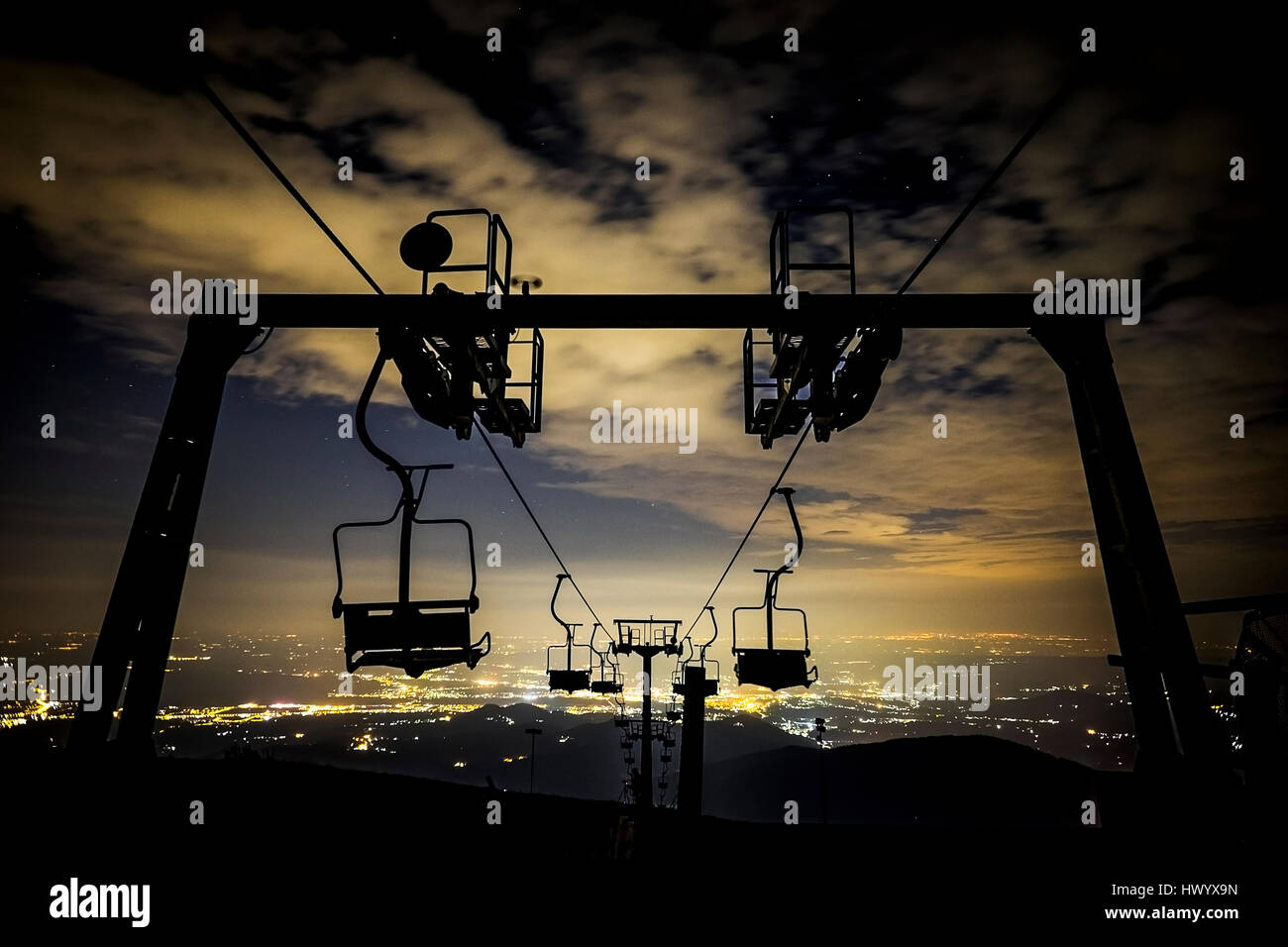 Italy, ski lift at night Stock Photo - Alamy