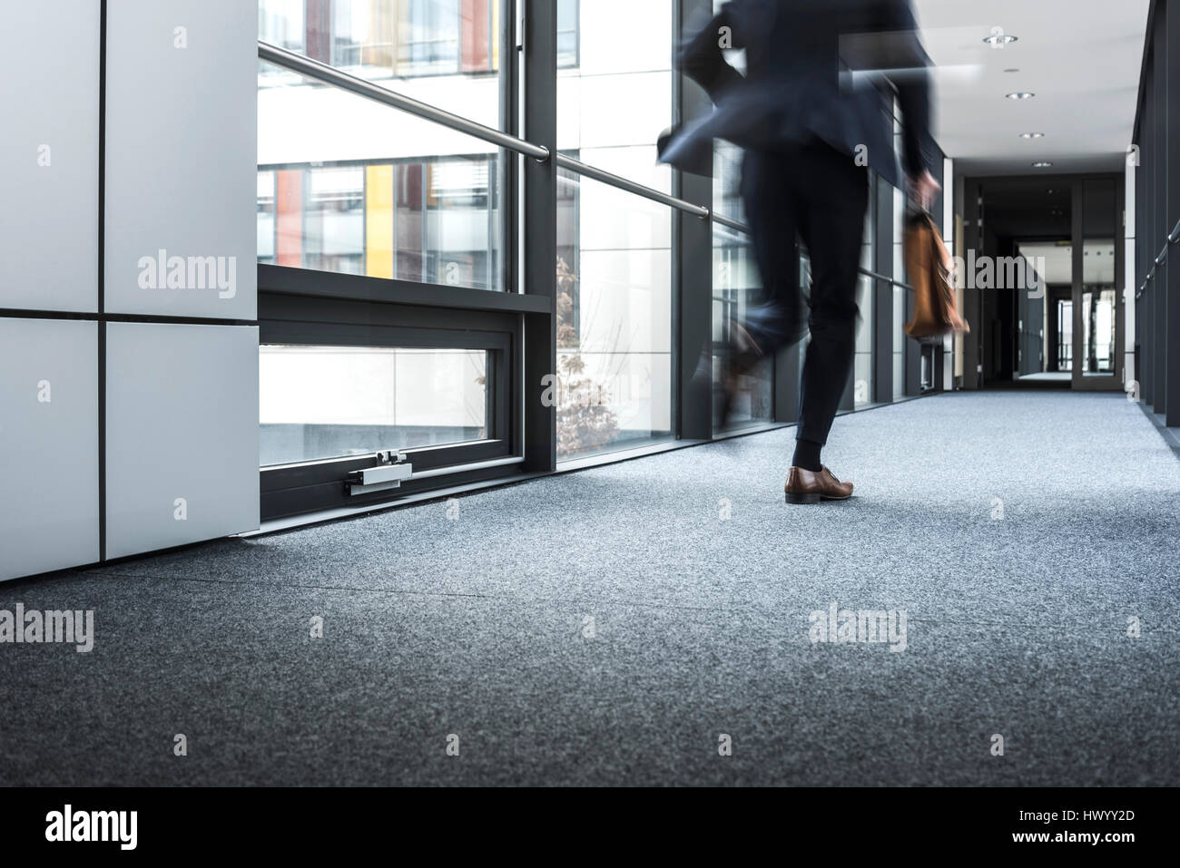 Man In Suit Running High Resolution Stock Photography and Images - Alamy