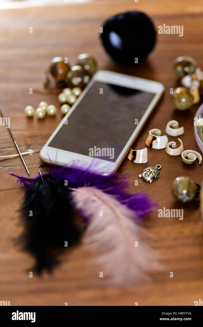 Cell phone and craft materials for handicraft Stock Photo - Alamy