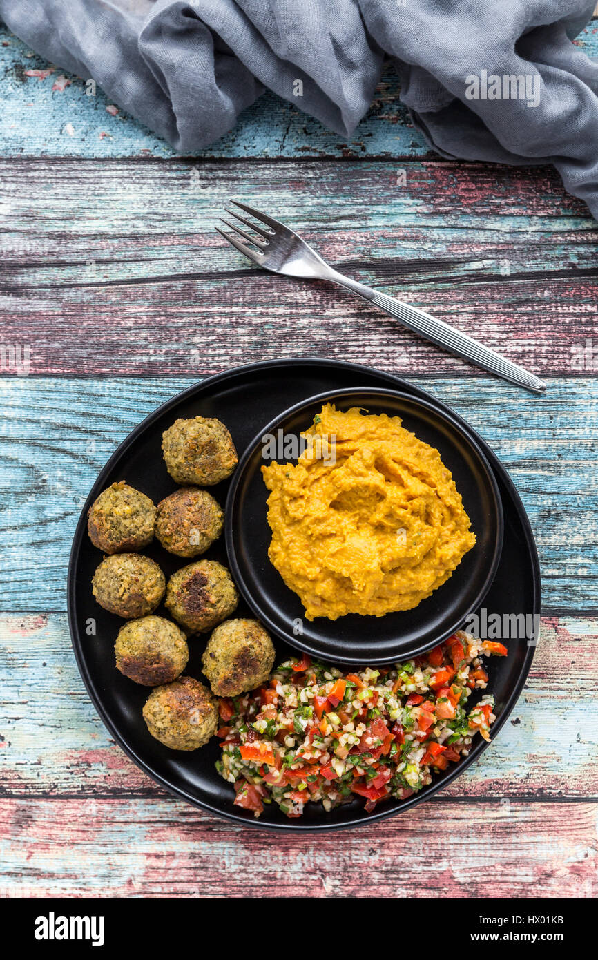 Falafel with Tabbouleh and Hummus Stock Photo - Alamy