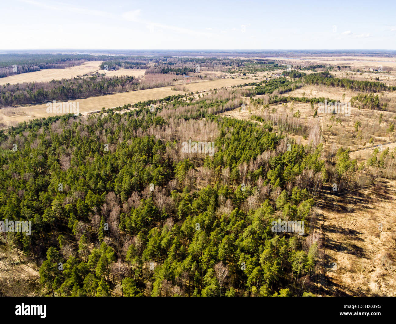 drone image. aerial view of rural area with fields and forests in ...