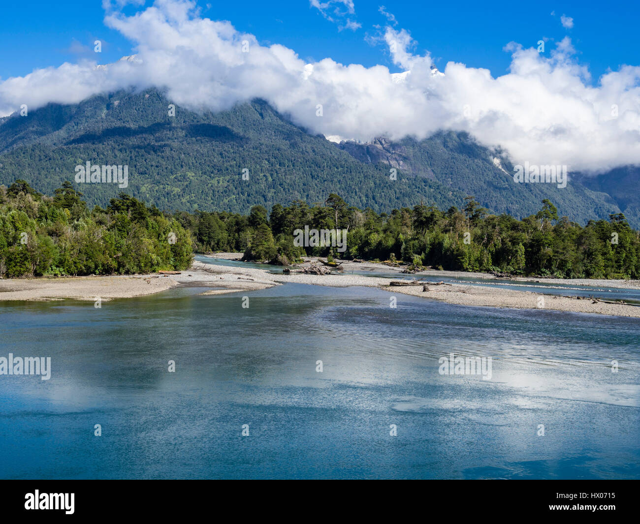 View from suspension bridge crossing the river Rio Yelcho, view towards ...