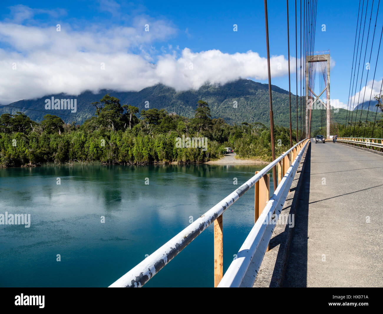 Suspension bridge crossing the river Rio Yelcho,south of Chaiten on ...