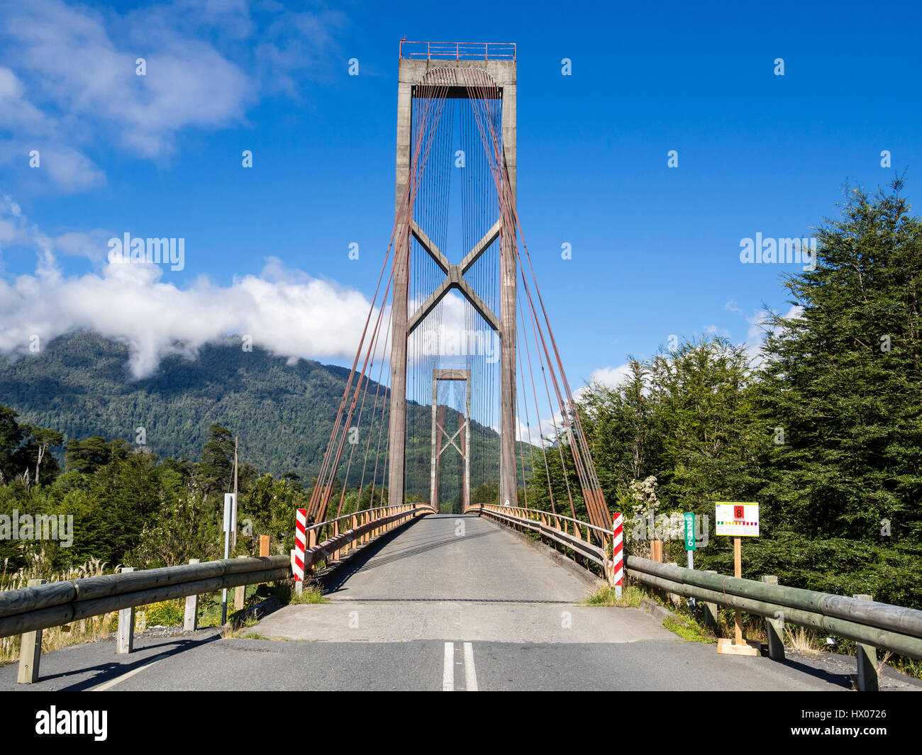 Suspension bridge crossing the river Rio Yelcho,south of Chaiten on ...