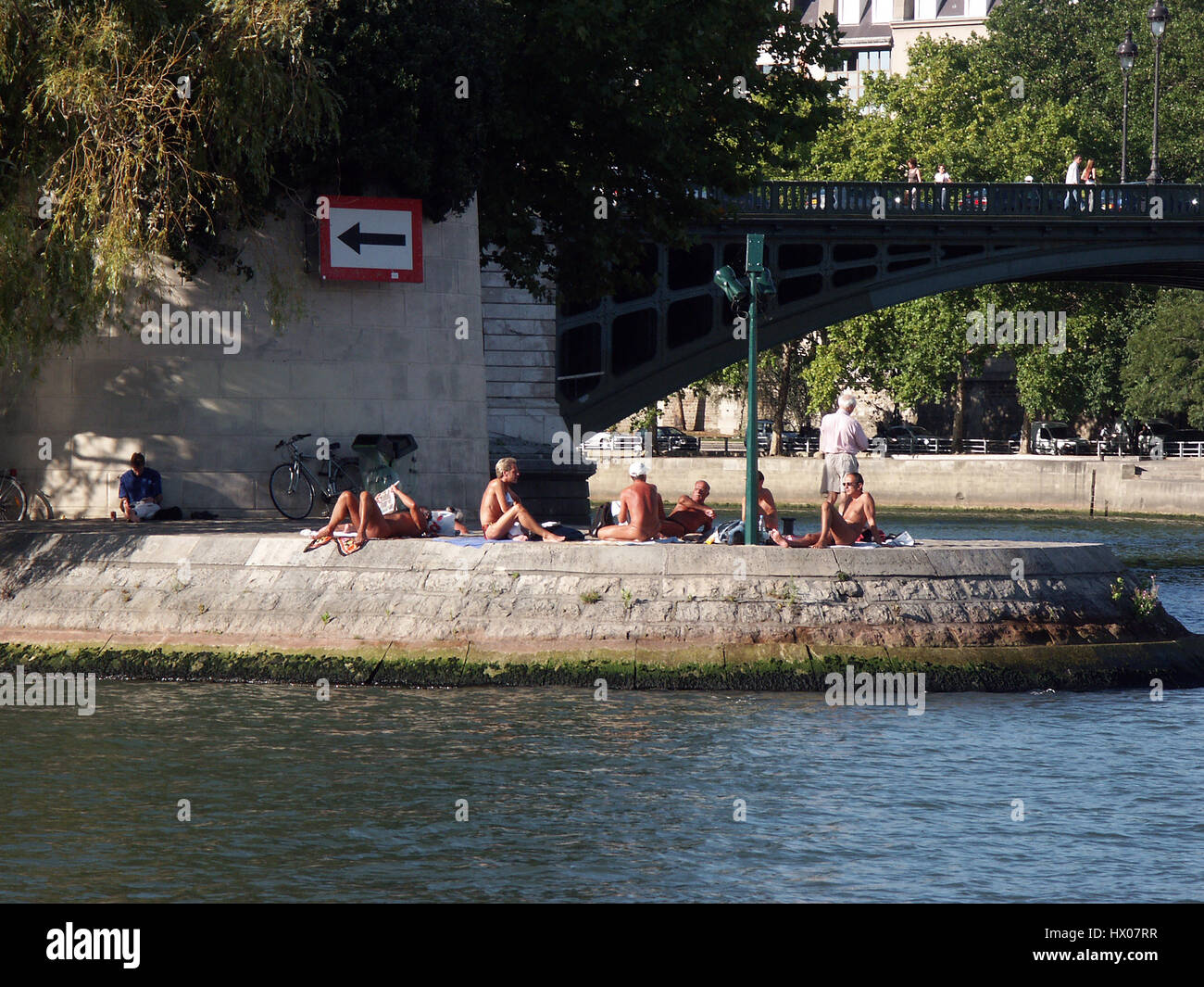 Sunbathers on the River Seine in Paris Stock Photo - Alamy
