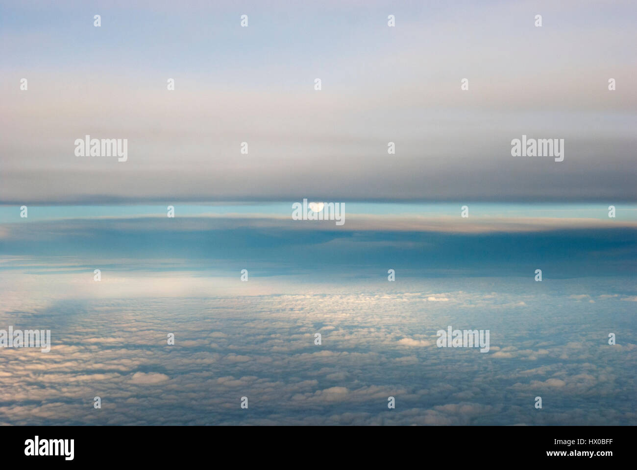 Aerial view of the moon and clouds from an airplane Stock Photo - Alamy