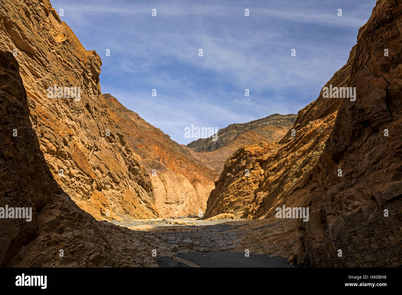 This is a view through a U-shaped opening in Mosaic Canyon in Death ...