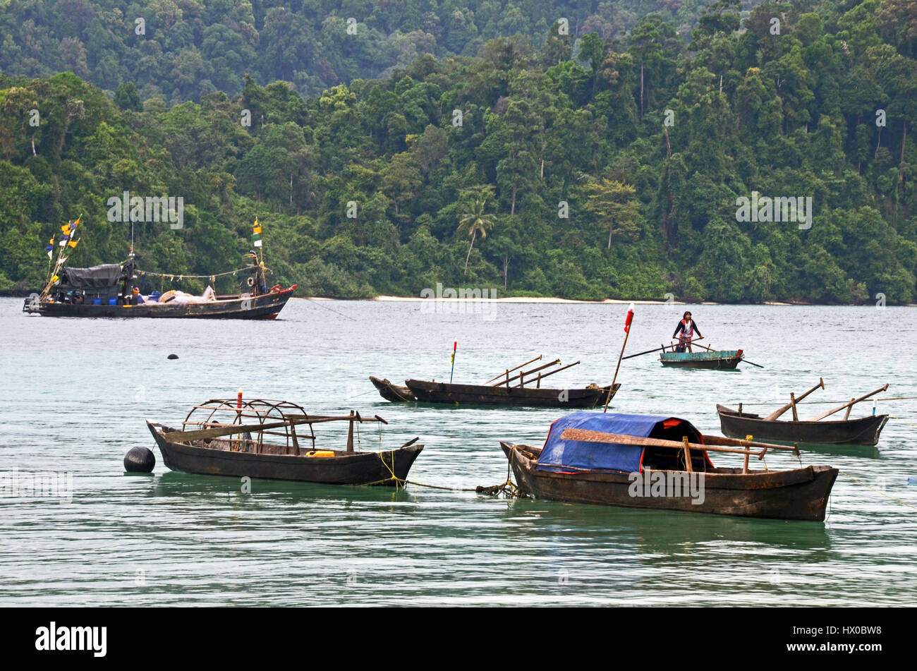 Fishing boats morored adjacent to the village of Makyone Galet, Lampi ...