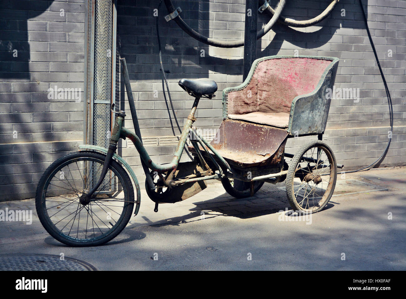 An Old Rickshaw In A Street In Beijing, China Stock Photo - Alamy