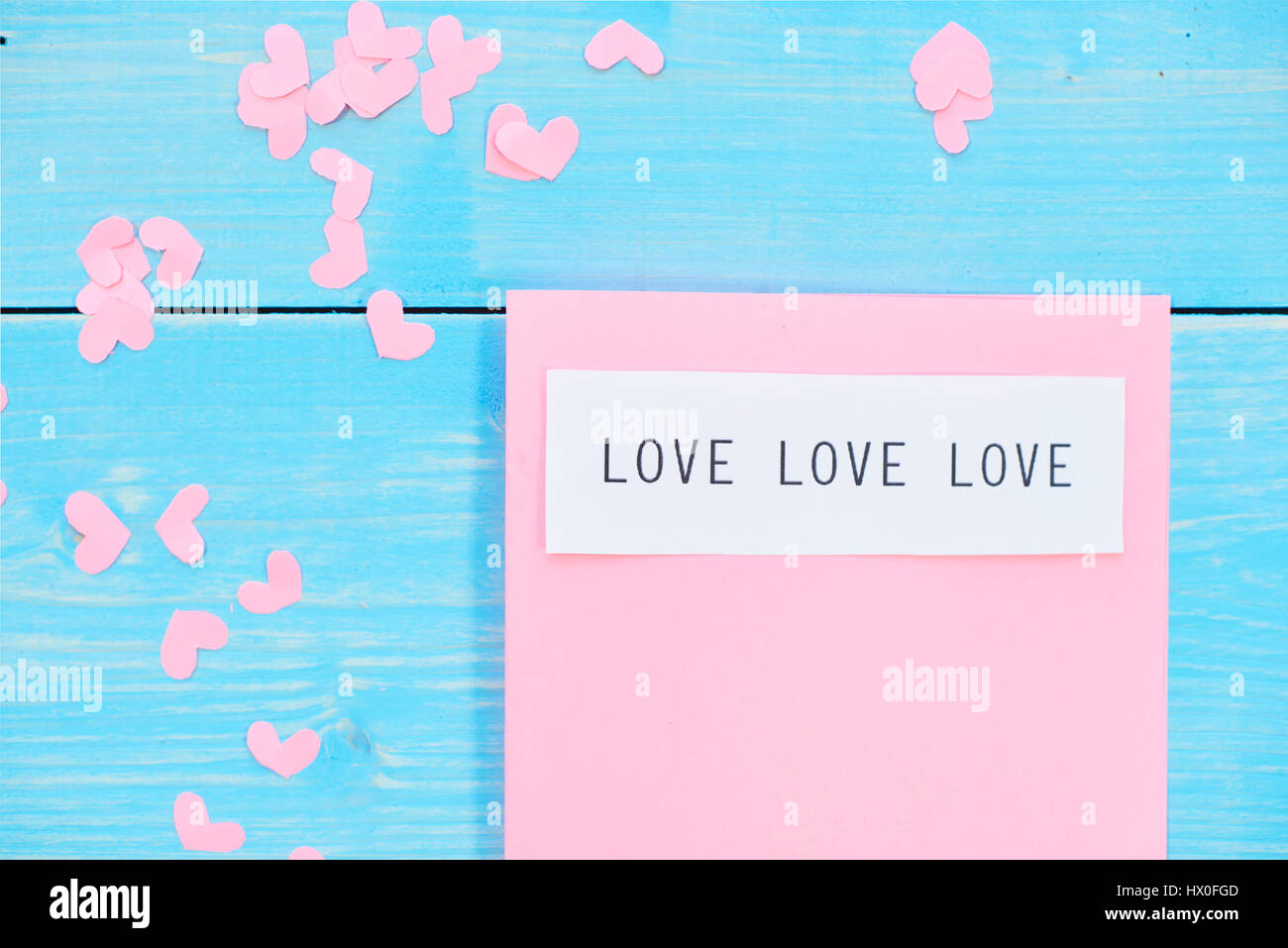Love words on blue background Stock Photo - Alamy