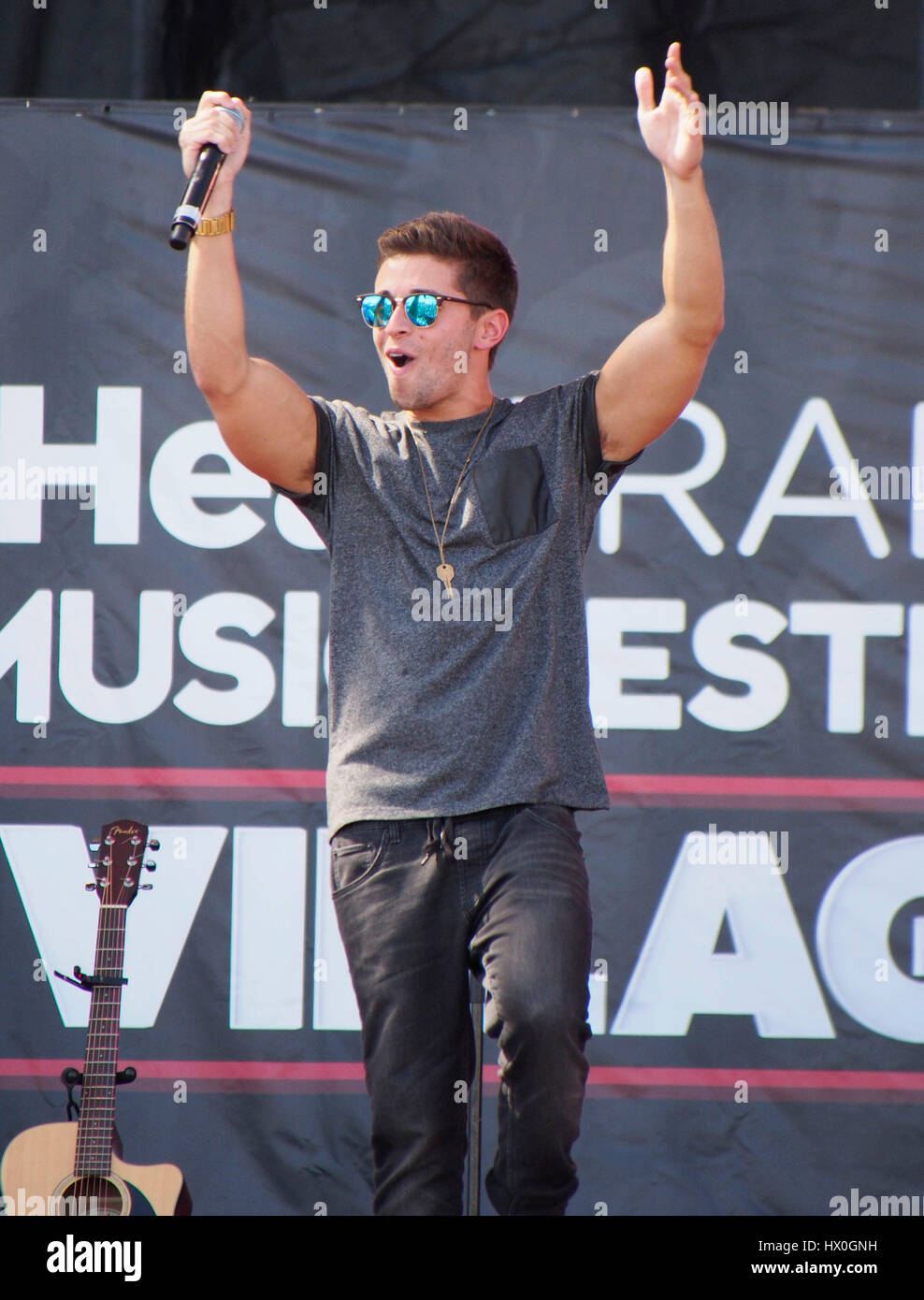 Jake Miller performs at the the iHeartRadio Music Festival & Village on ...
