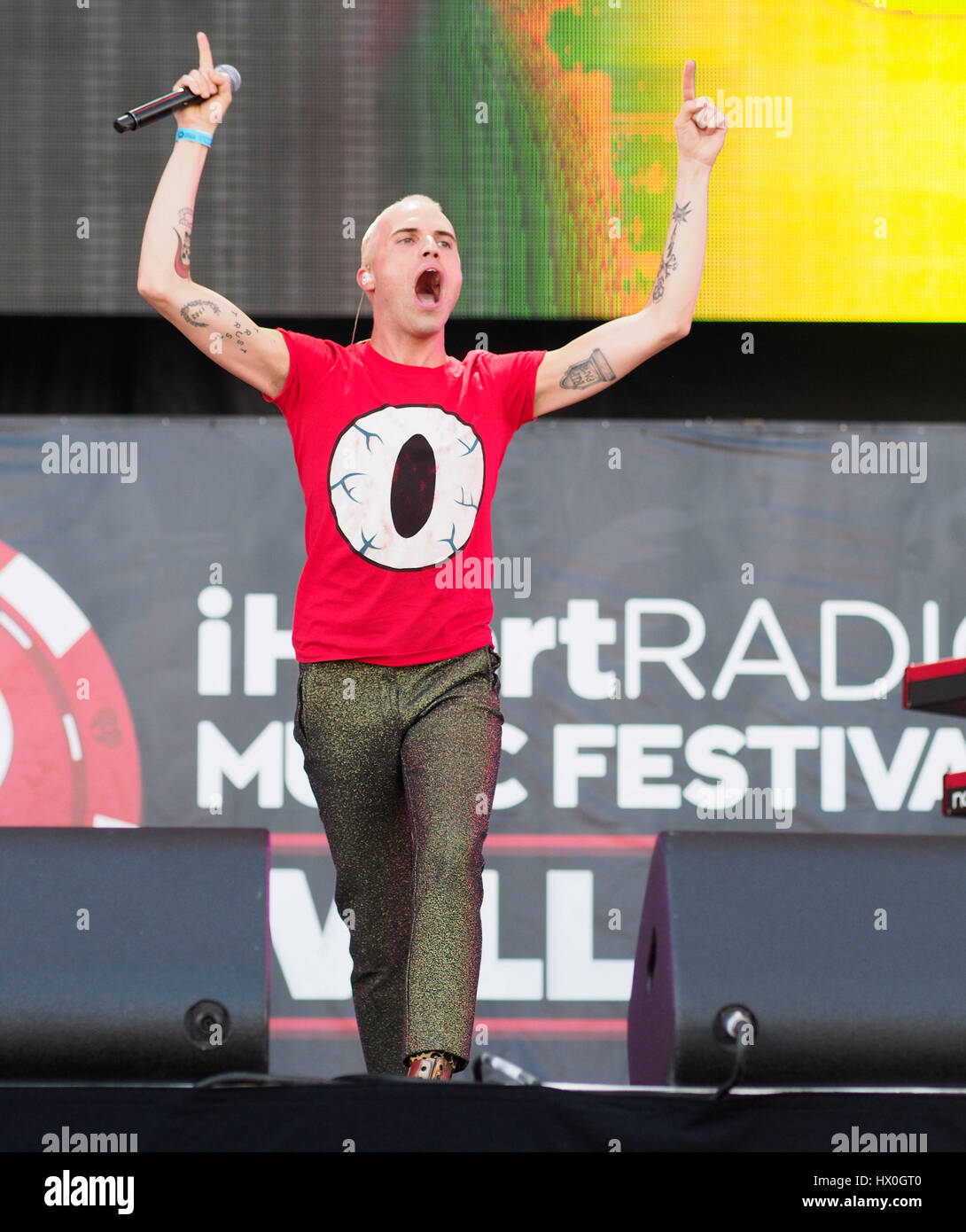 Tyler Glenn of Neon Trees perform at the the iHeartRadio Music Festival ...