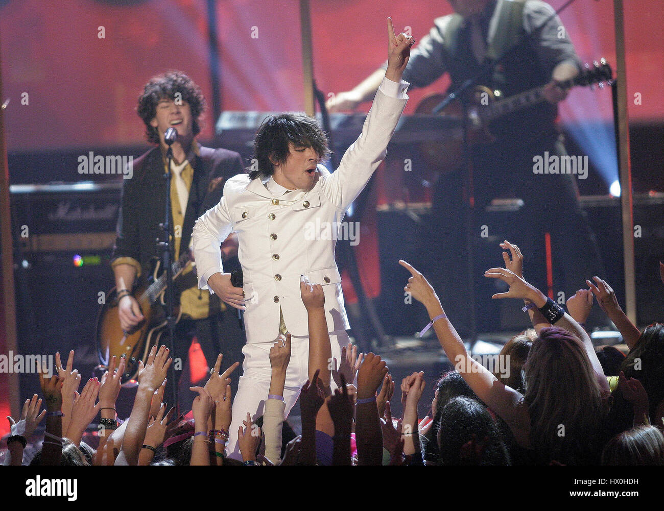 Lead singer Joe Jonas sings during the Jonas Brothers performance at ...