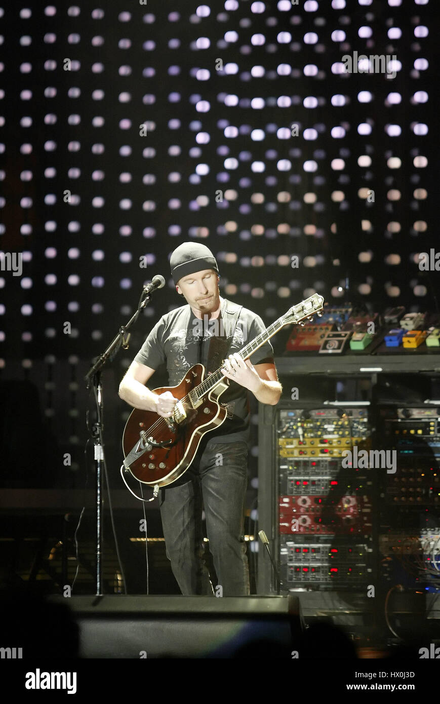 The Edge of the rock group, U2, in concert in San Diego, CA on March 28 ...