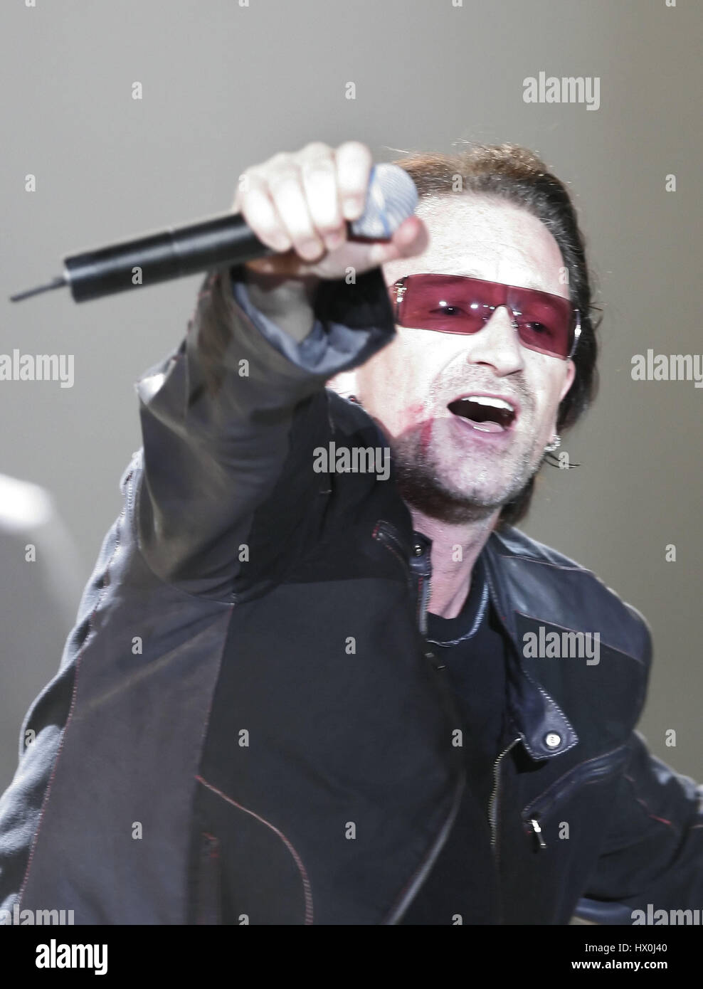 Lead singer of U2, Bono, in concert in San Diego, CA on March 28 2005 ...