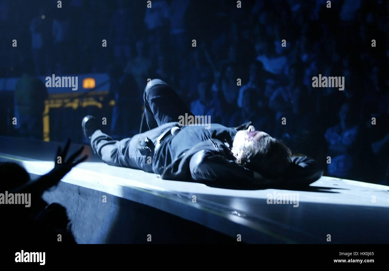 Lead singer of U2, Bono, in concert in San Diego, CA on March 28 2005 ...