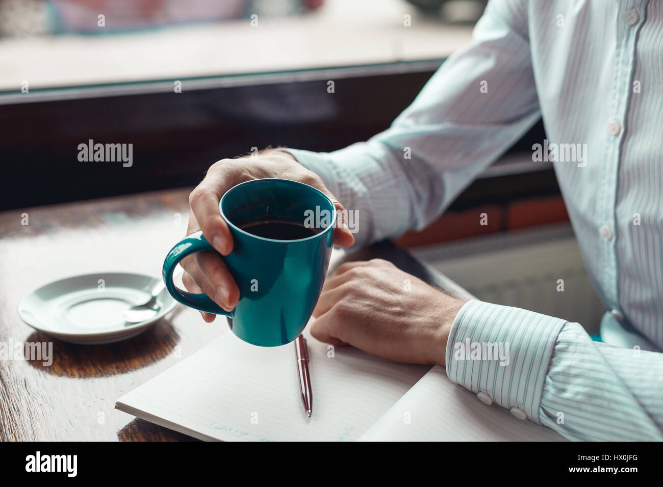 Close up coffee break businessman hands holding mug of coffee Stock ...
