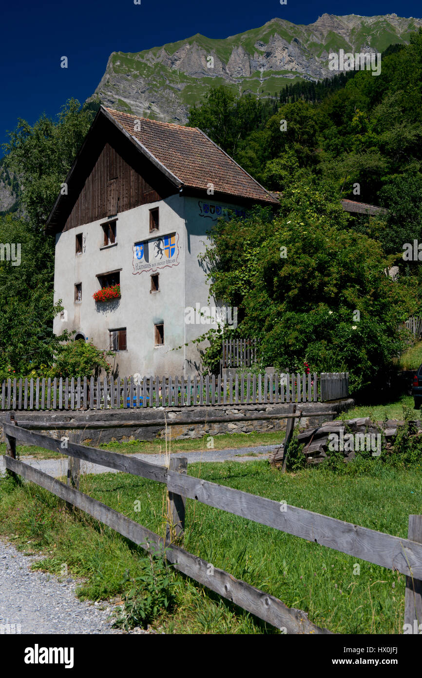 Mountain town hall in switzerland alps Stock Photo - Alamy