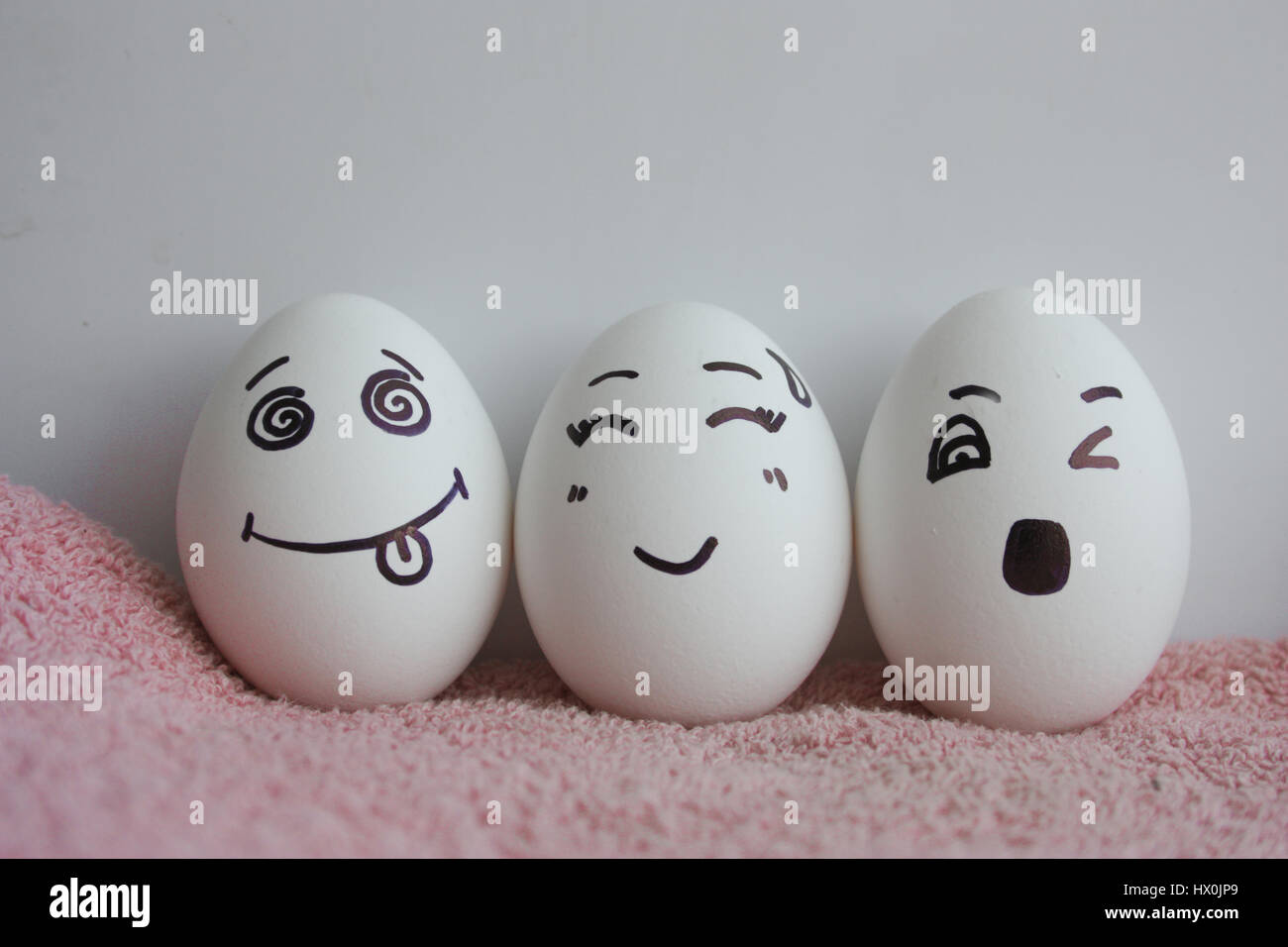 Eggs are cheerful with a face. Three pieces. Concept best friends ...
