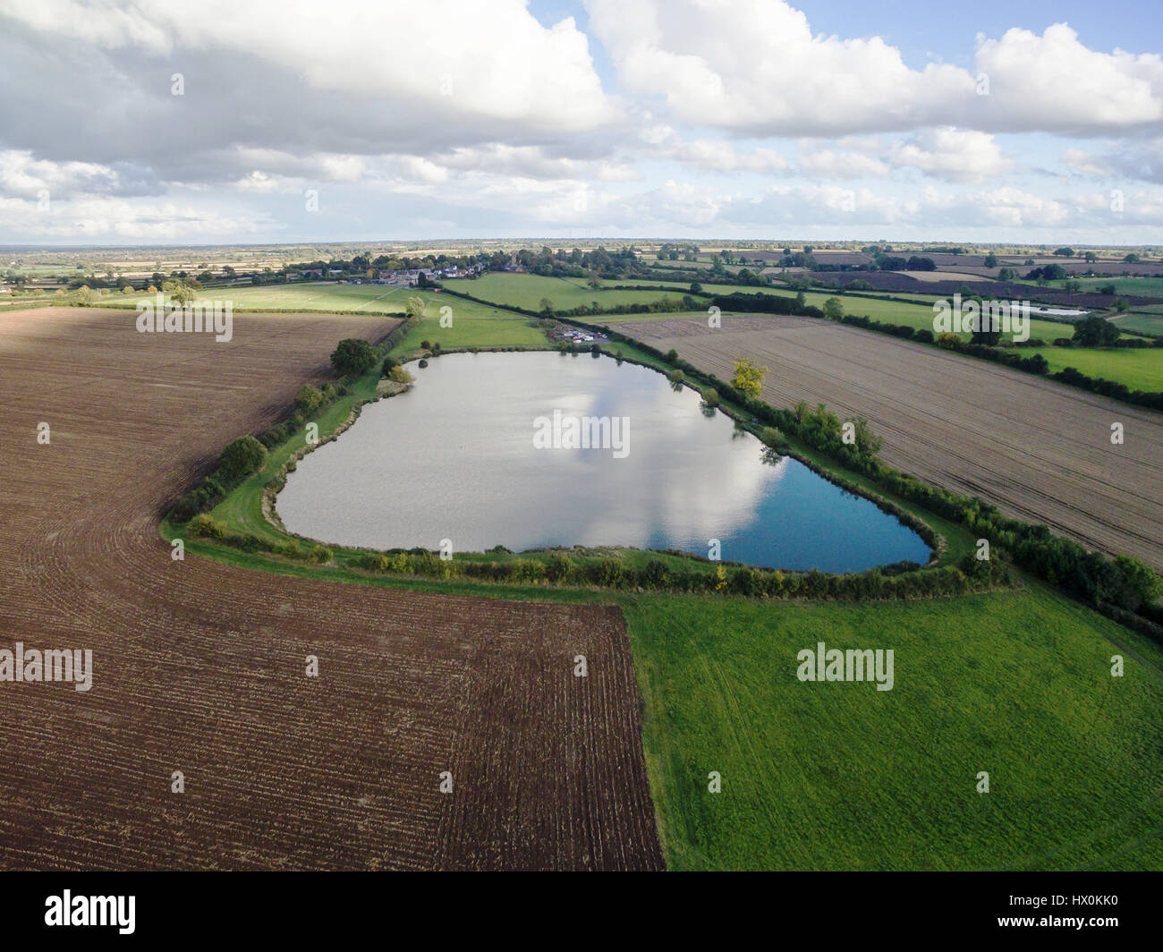 Aerial view over a lake in the summertime in the UK Stock Photo - Alamy