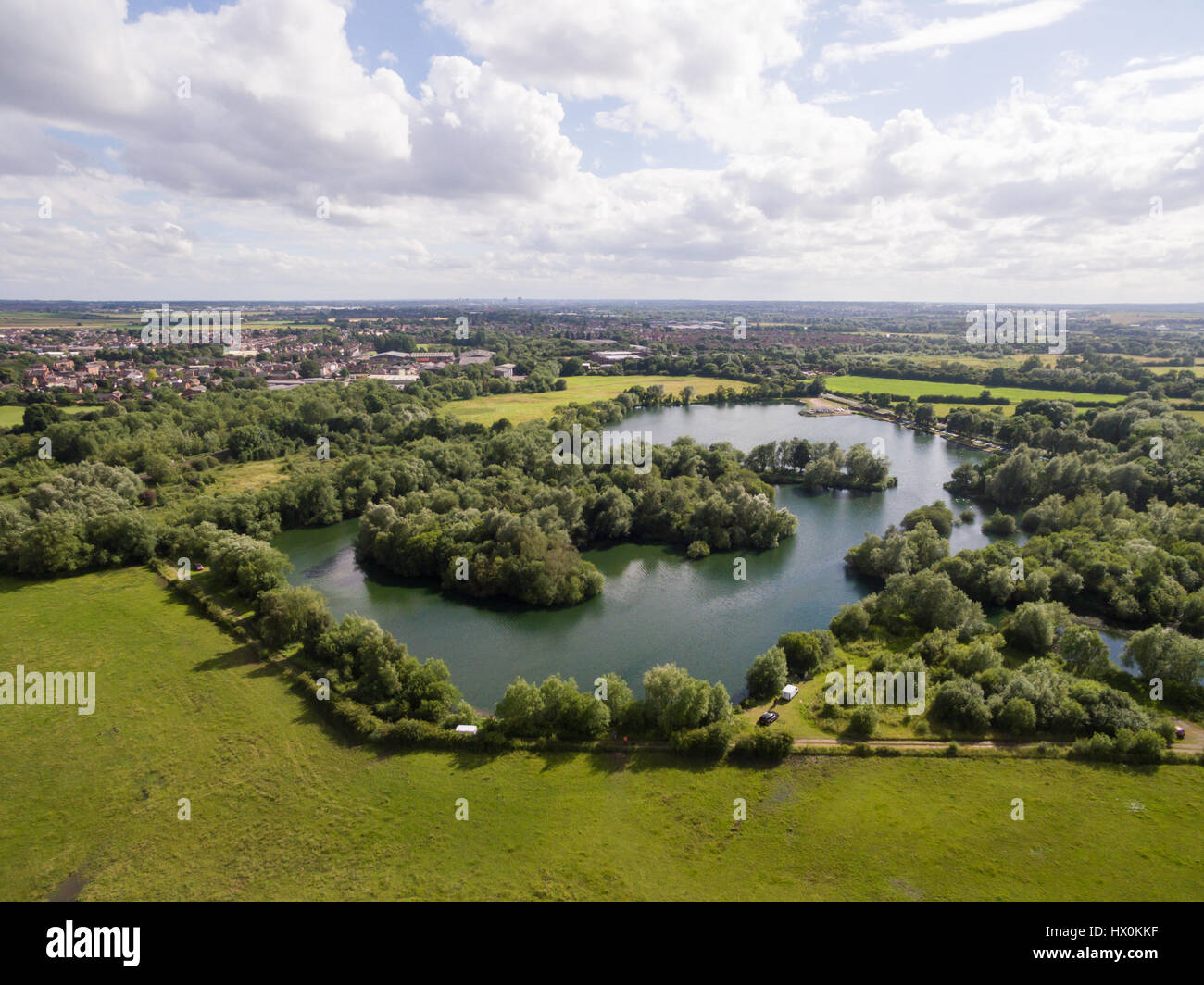 Aerial view over a lake in the summertime in the UK Stock Photo - Alamy