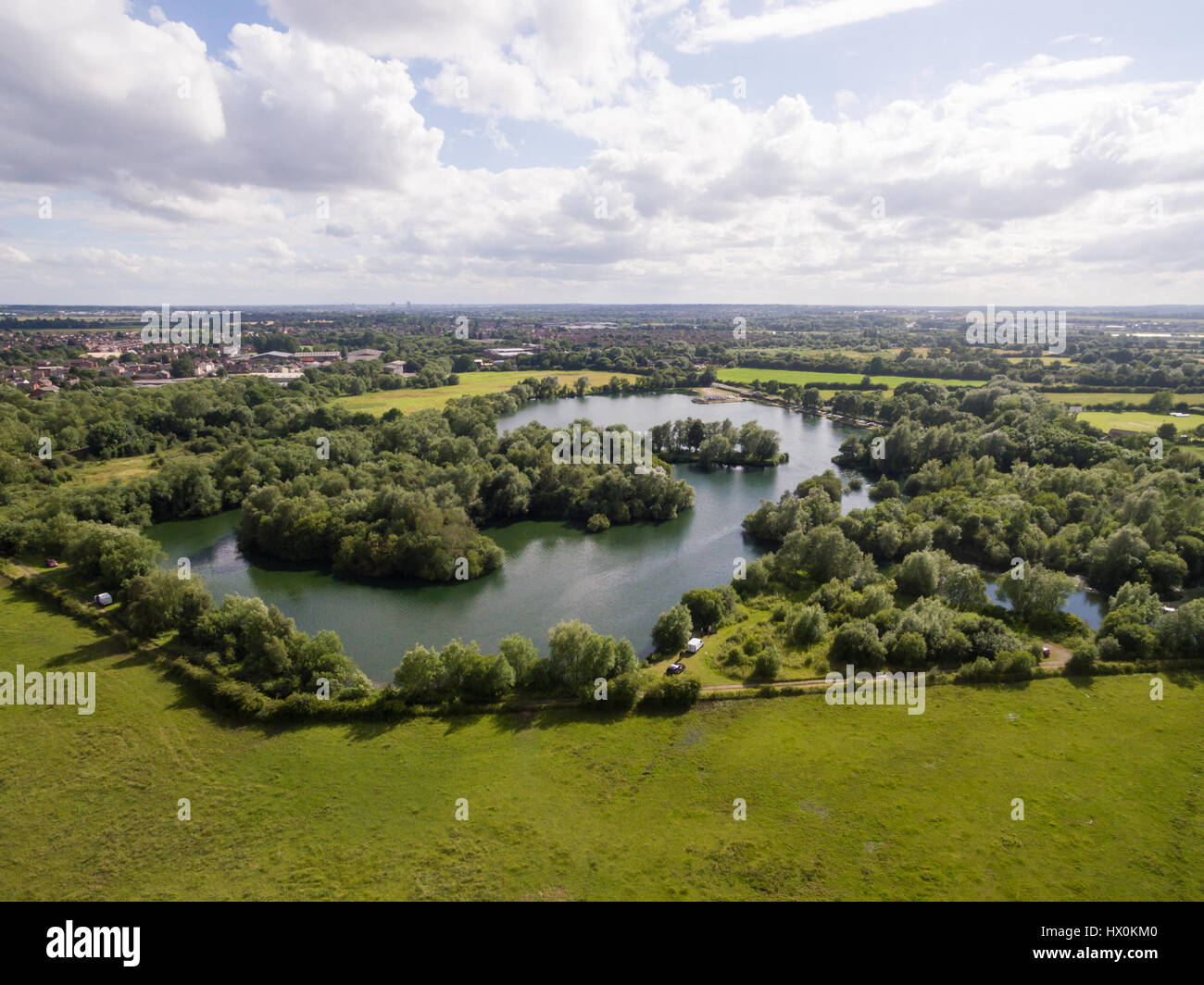 Aerial view over a lake in the summertime in the UK Stock Photo - Alamy