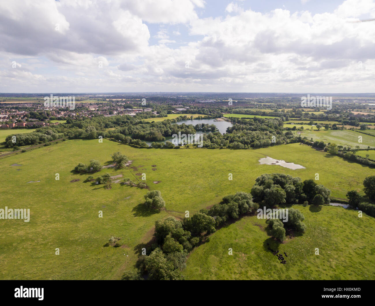 Aerial view over a lake in the summertime in the UK Stock Photo - Alamy