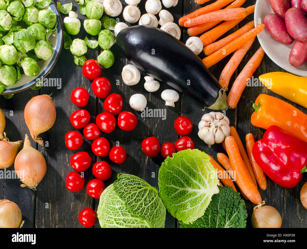 Organic vegetables on rustic wooden table. Top view Stock Photo - Alamy